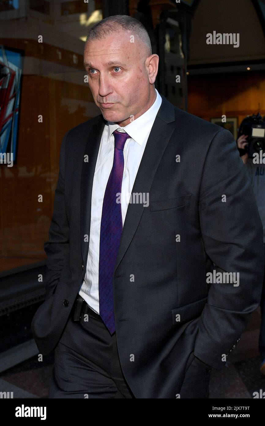 Adrian Gard leaves the Downing Centre Court, in Sydney, Wednesday ...