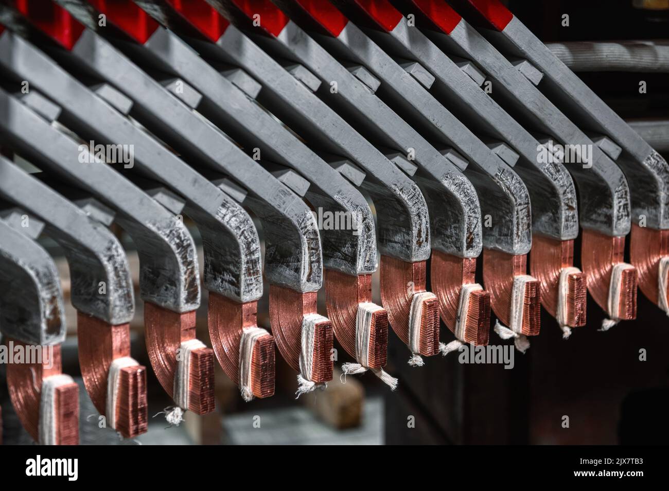 Copper bus elements of stator winding of electric motor Stock Photo - Alamy