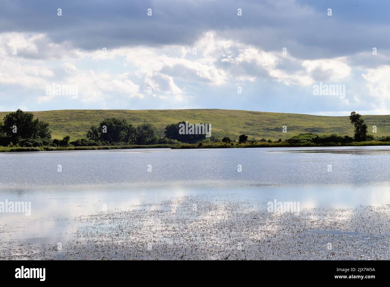Bloomingdale, Illinois, USA. A small lake sits below a completed ...