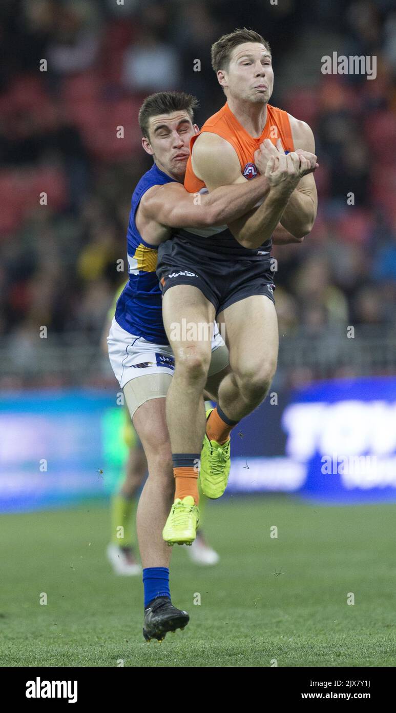 Elliot Yeo of the Eagles tackles Toby Greene of the Giants during the ...