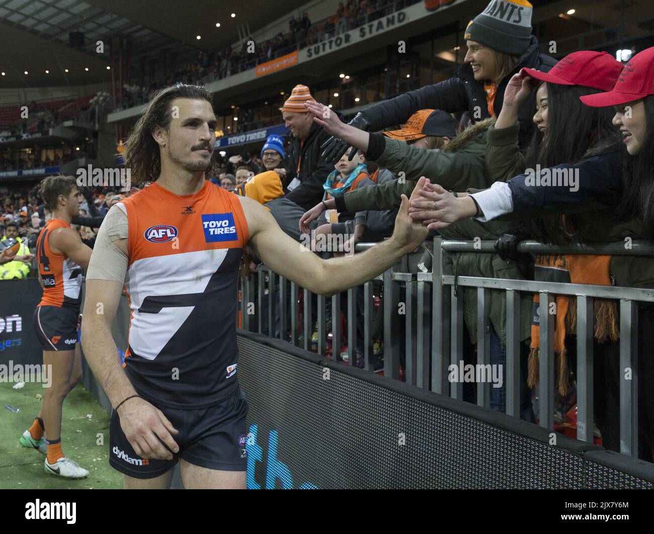 Phil Davis of the Giants with fans after the Round 22 AFL match between ...