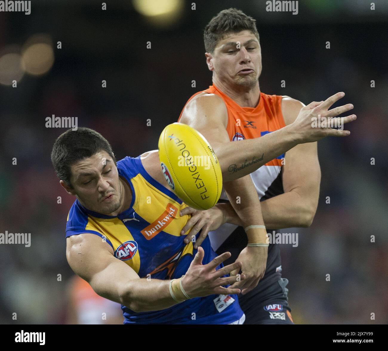 Jonathon Patton of the Giants and Thomas Barrass of the Eagles contest ...