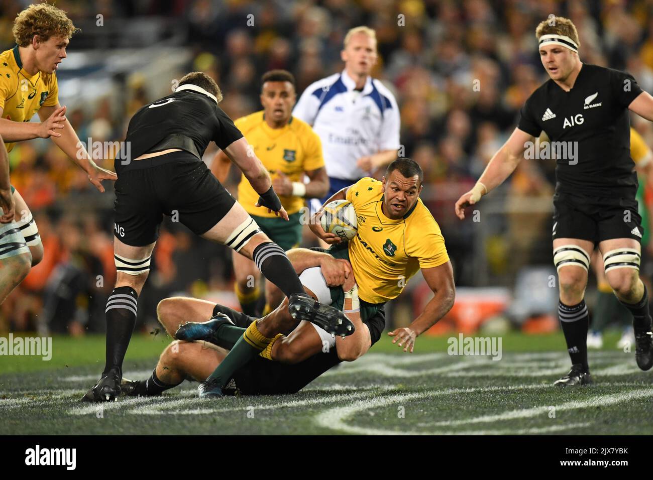 Kurtley Beale of Australia tackled by Joe Moody of New Zealand during ...