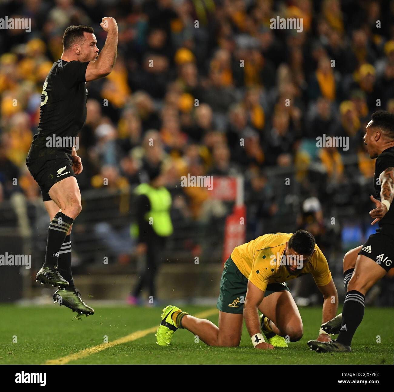 Ryan Crotty (left) of New Zealand celebrates his try during game 1 of ...