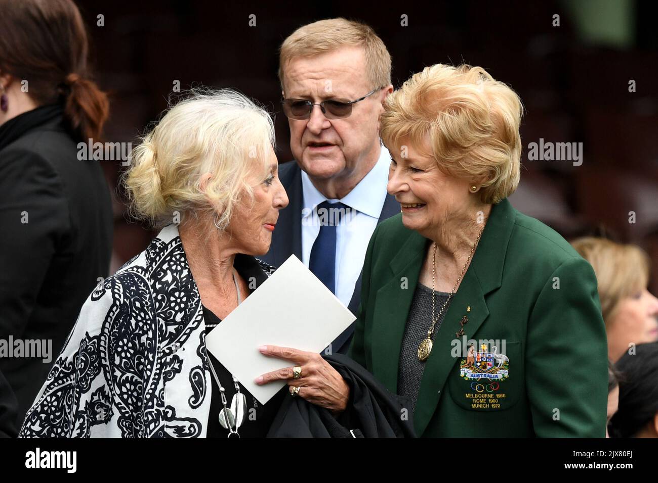 Marie (left), the twin sister of Betty Cuthbert, AOC president John ...