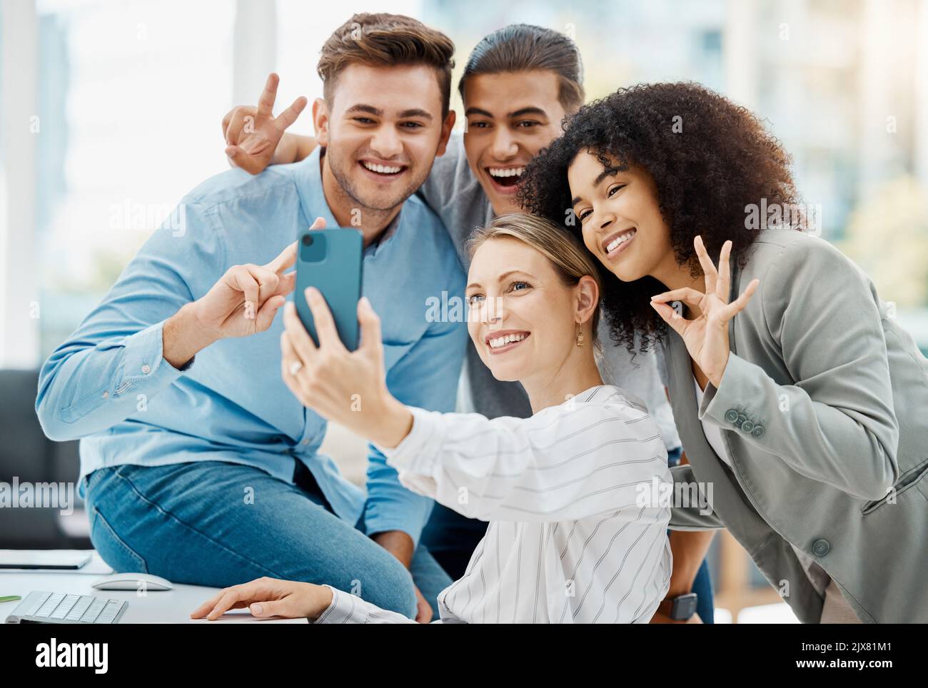 Teamwork, emoji hands and business people selfie with a smartphone for ...