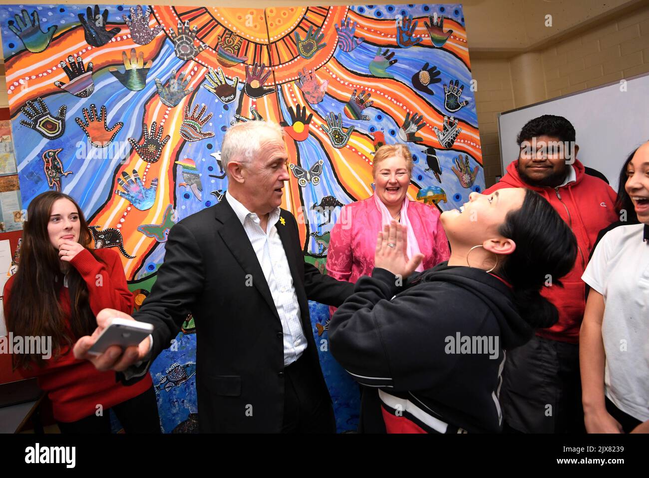 Australian Prime Minister Malcolm Turnbull speaks to a student as he ...