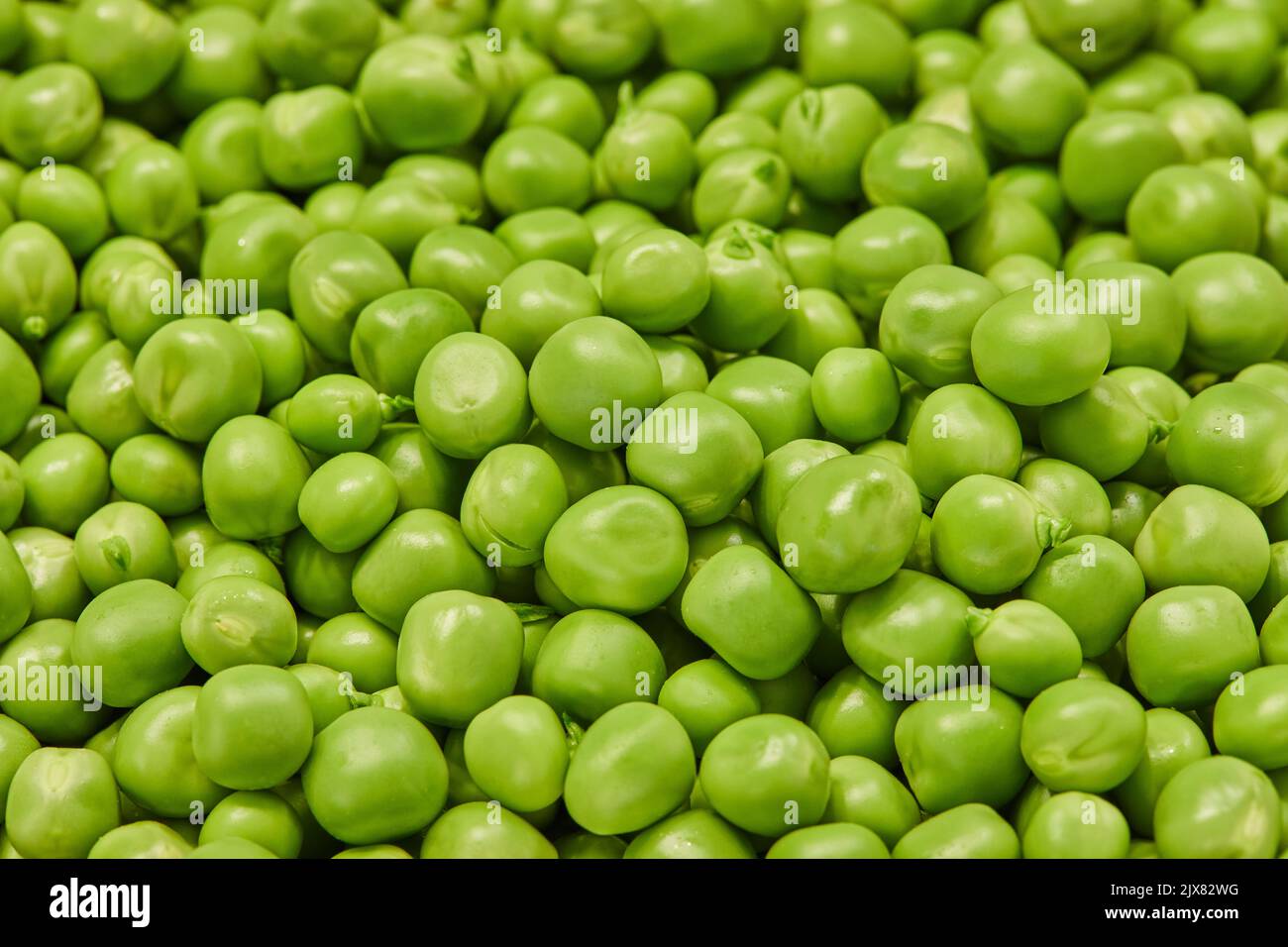 Background Fresh green peas heap on wooden texture background Stock ...