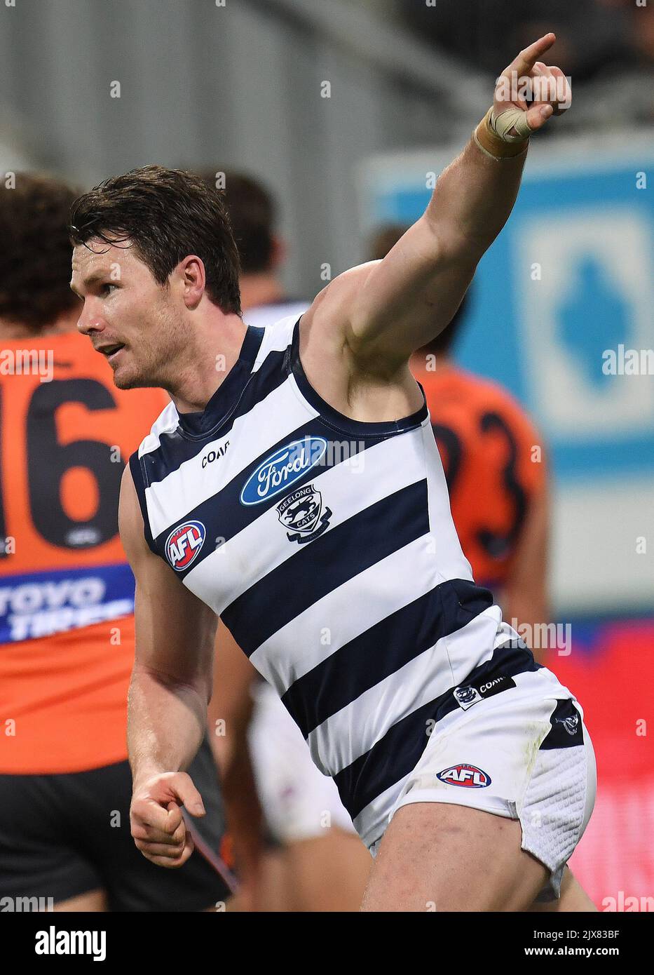 Patrick Dangerfield of the Cats reacts after kicking a goal during the ...