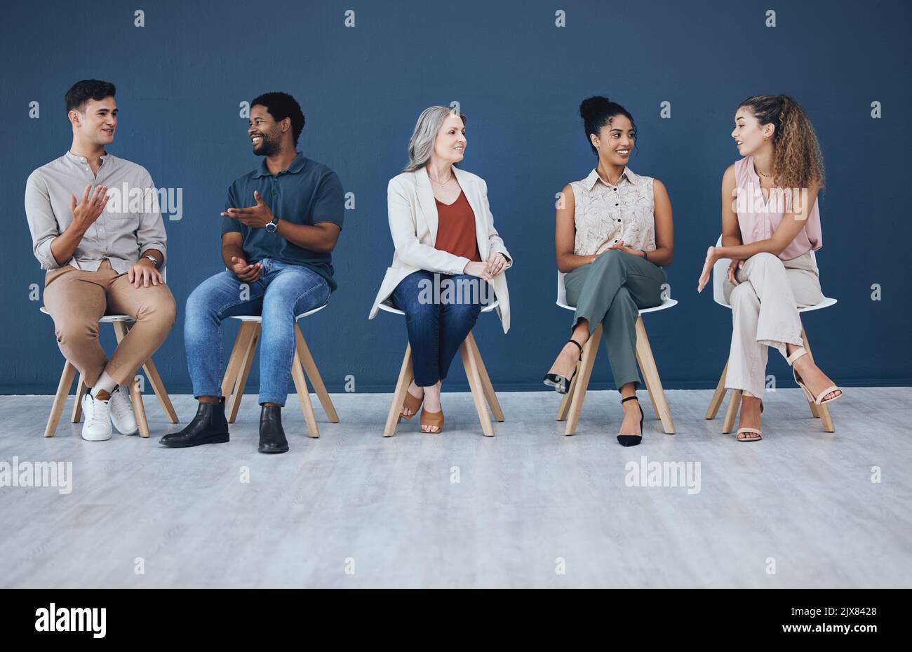 Diversity, business people and recruitment chair row in lobby for ...
