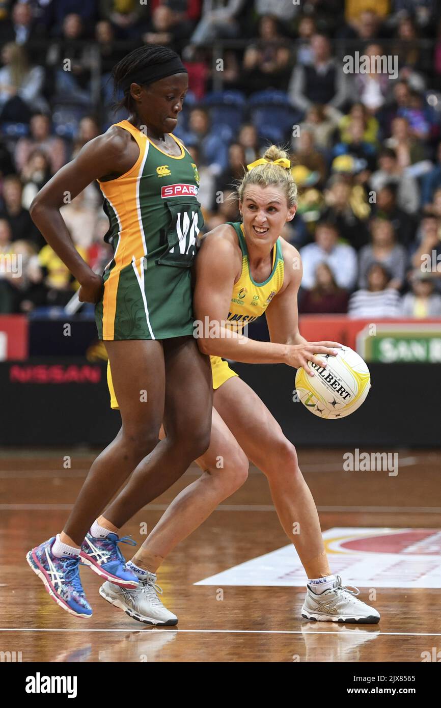 Bongine Msomi of South Africa (left) fights for the ball with Gabi ...