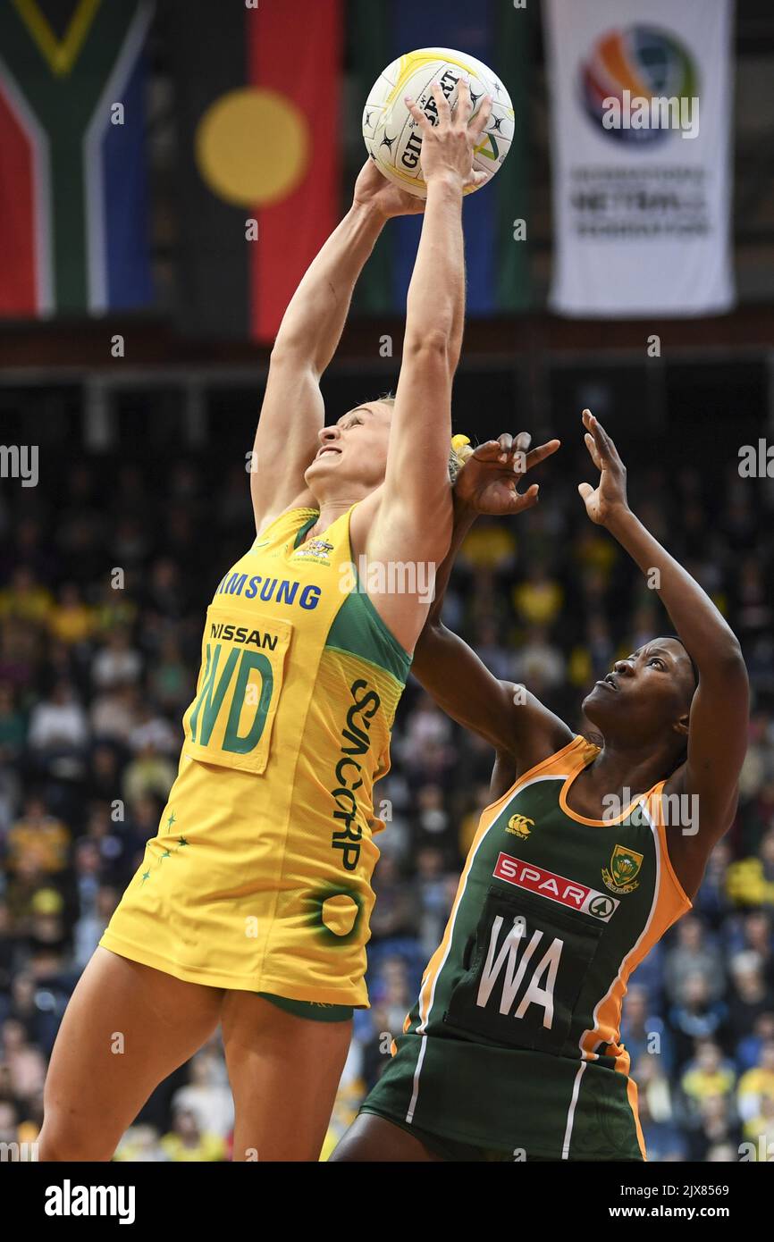 Gabi Simpson of Australia (left) fights for the ball with Bongine Msomi ...