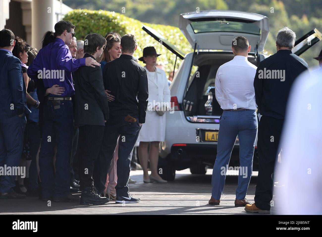 The family of Hannah Rye (left) and NRL Newcastle Knights player Danny Levi (right) pay their ...