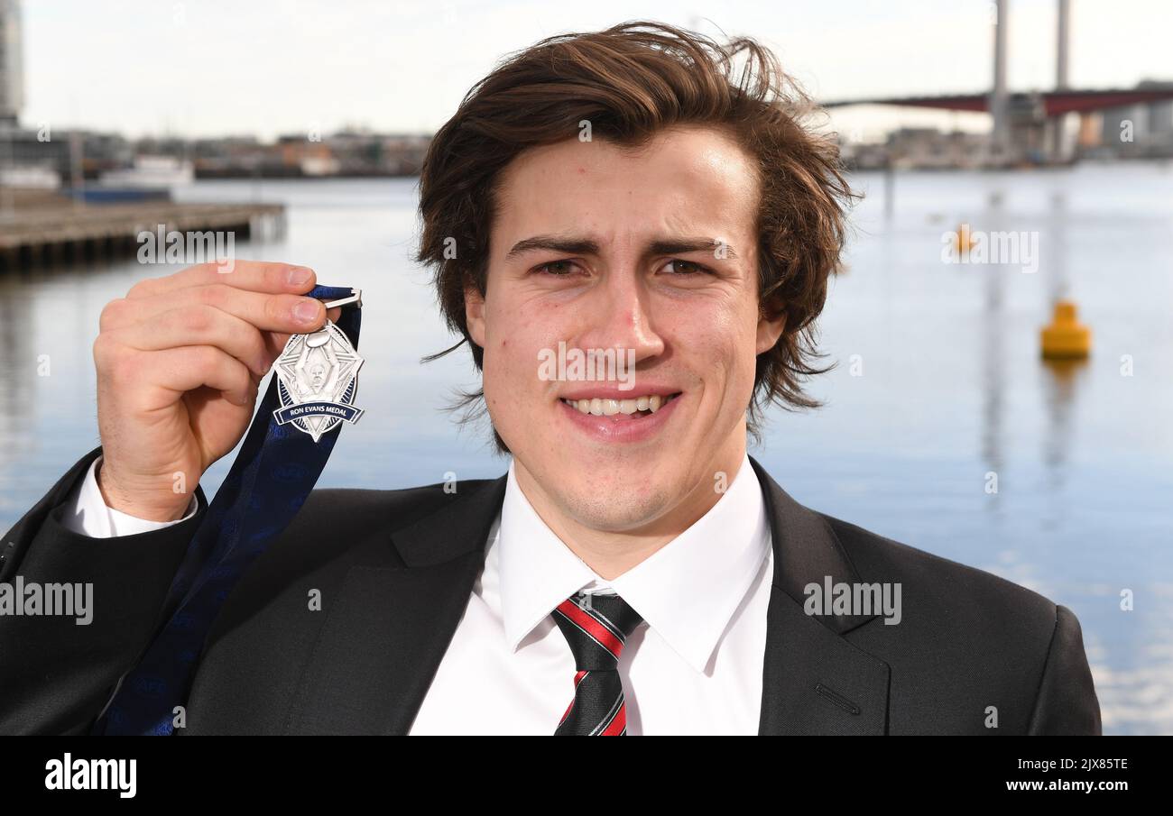 Andrew McGrath of the Essendon Bombers poses for a photo with the NAB AFL Rising Star Award at ...