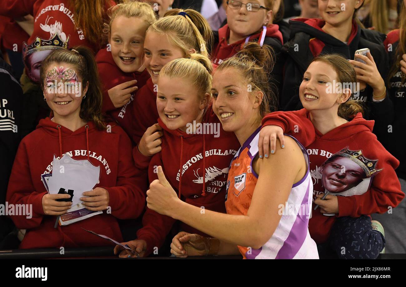 Emma King of the Allies poses for photos with fans after the AFLW State ...