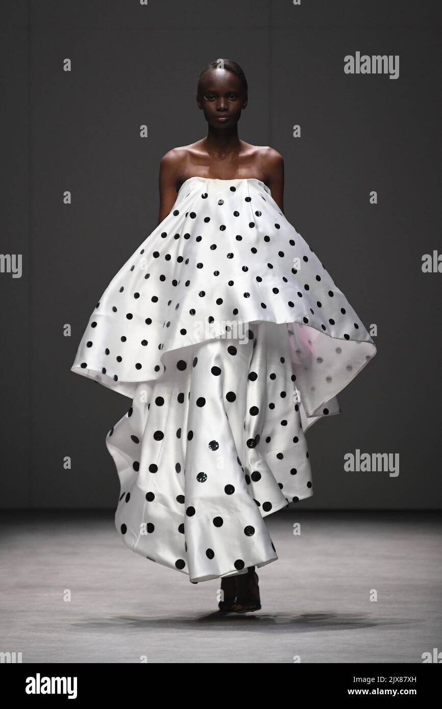 A Model walks the Premium Runway two wearing a Sarah Hope Schofield ...