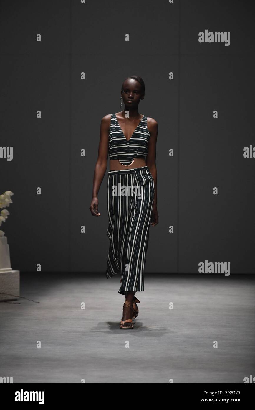 A Model walks the Premium Runway two wearing an GINGER & SMART outfit ...