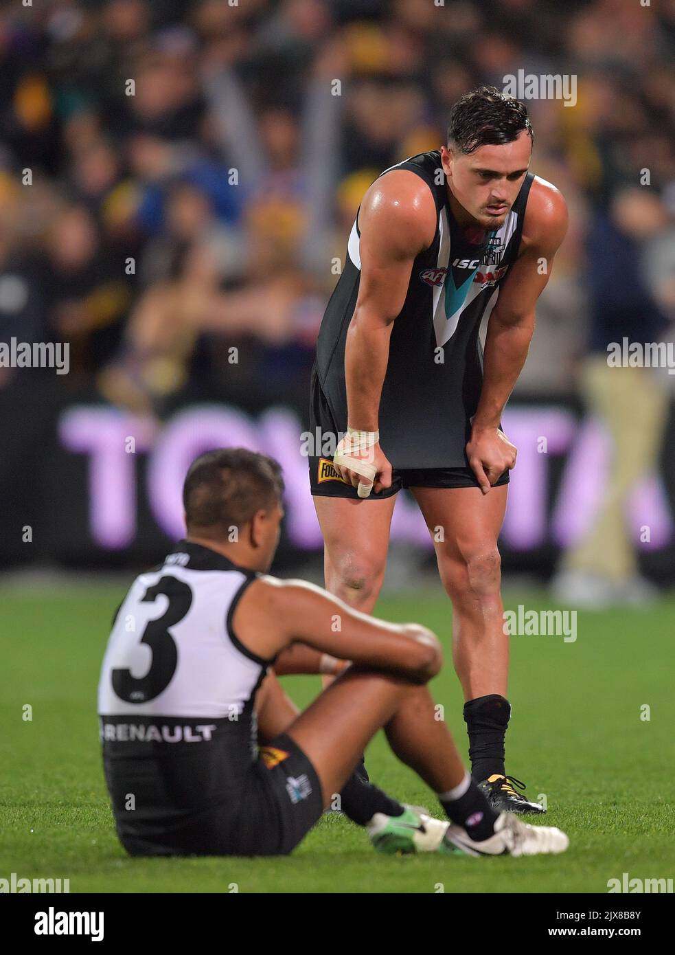 A dejected Jake Neade and Sam Powell-Pepper of the Power after the AFL ...