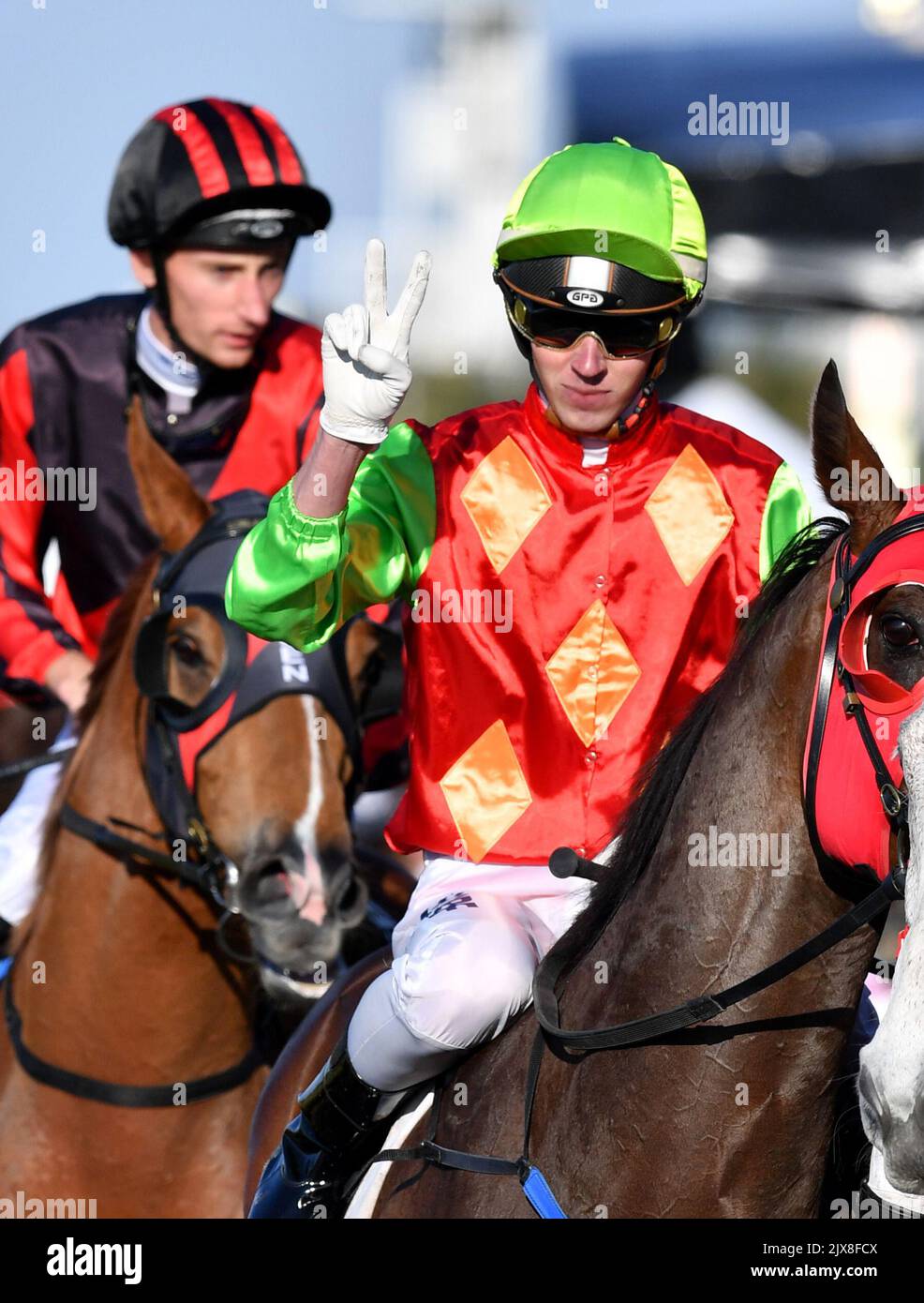 Jockey James Orman (right) riding #7 Lordag returns to scale after ...