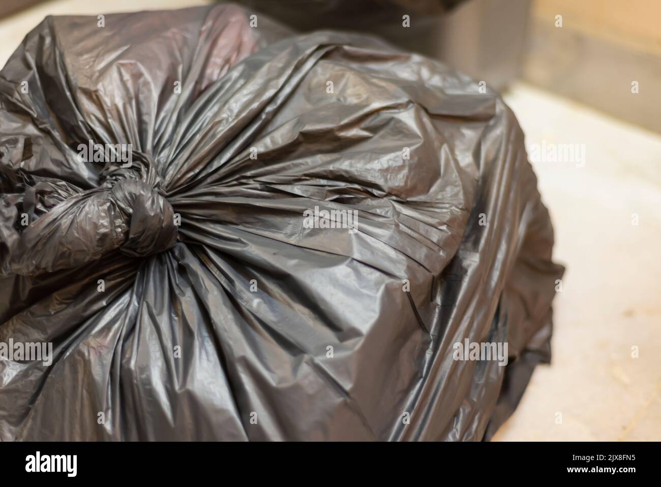 Bag garbage hi-res stock photography and images - Alamy