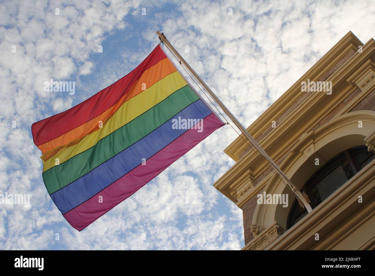 A rainbow pride flag flies on Broken Hill town hall in Broken Hill ...
