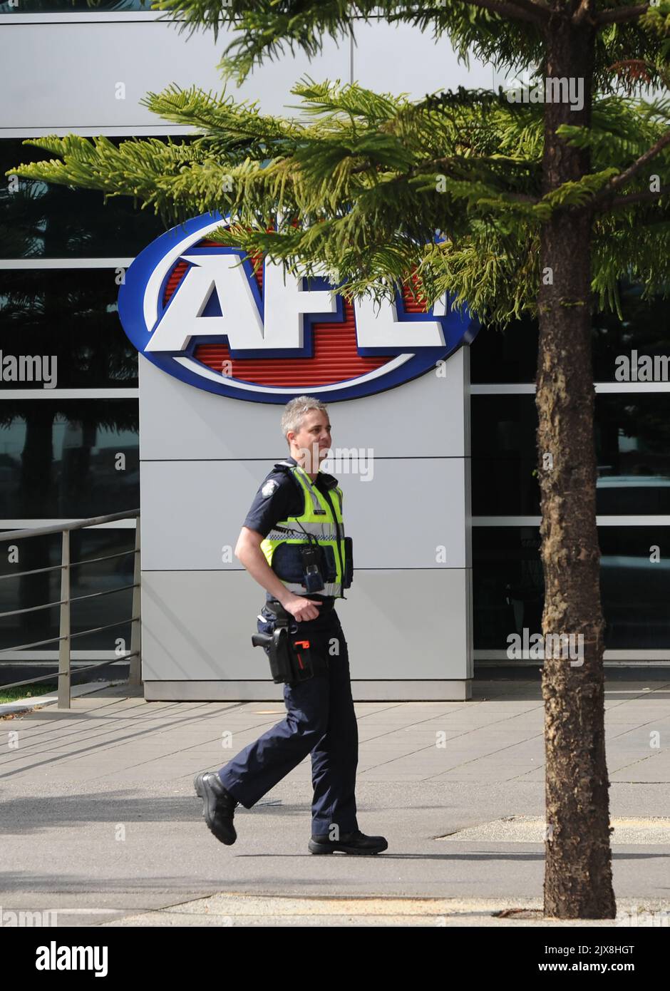 Police evacuate the AFL House building in Melbourne on Thursday ...