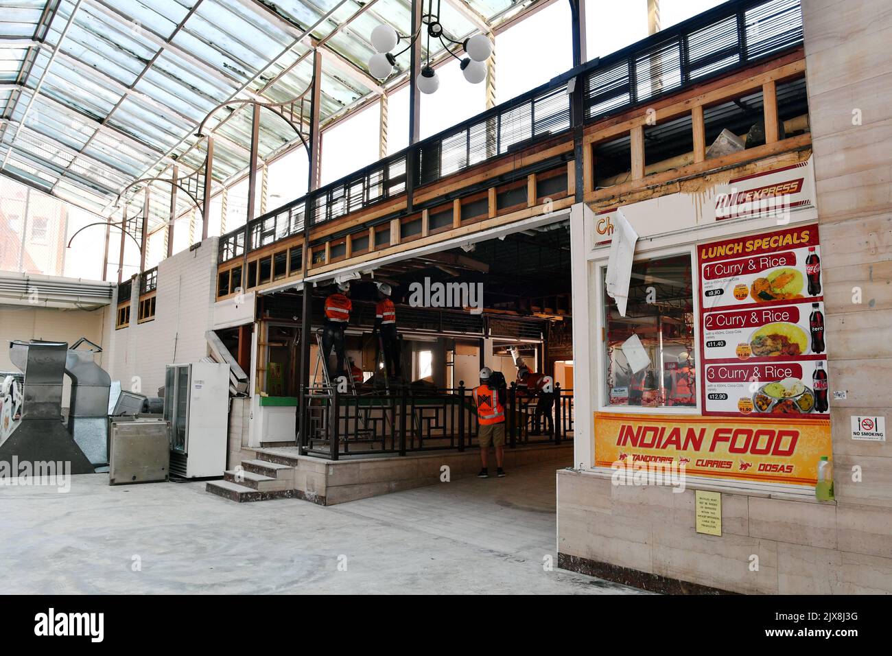 Construction workers are seen working inside of the site that was the ...