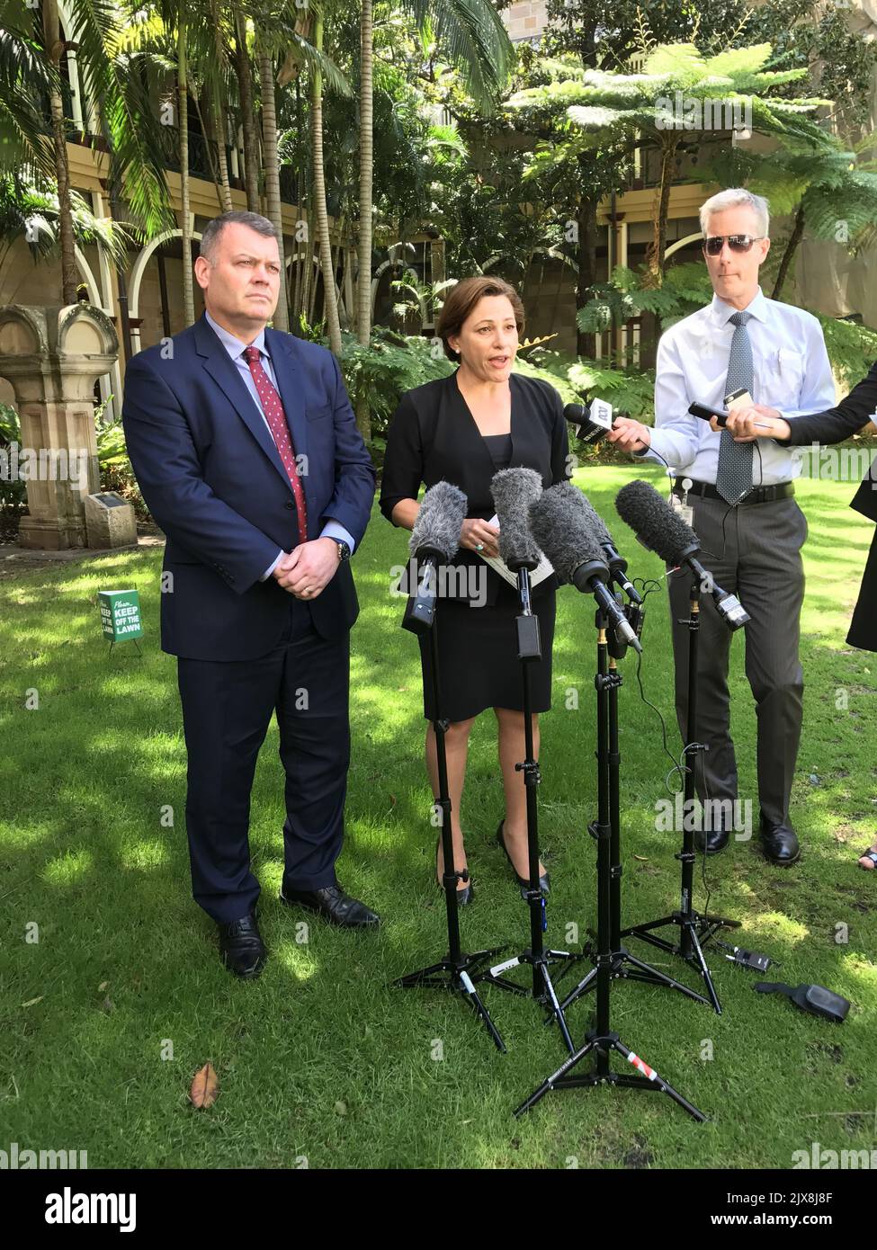 Queensland Deputy Premier Jackie Trad (centre) and Queensland Rail CEO ...