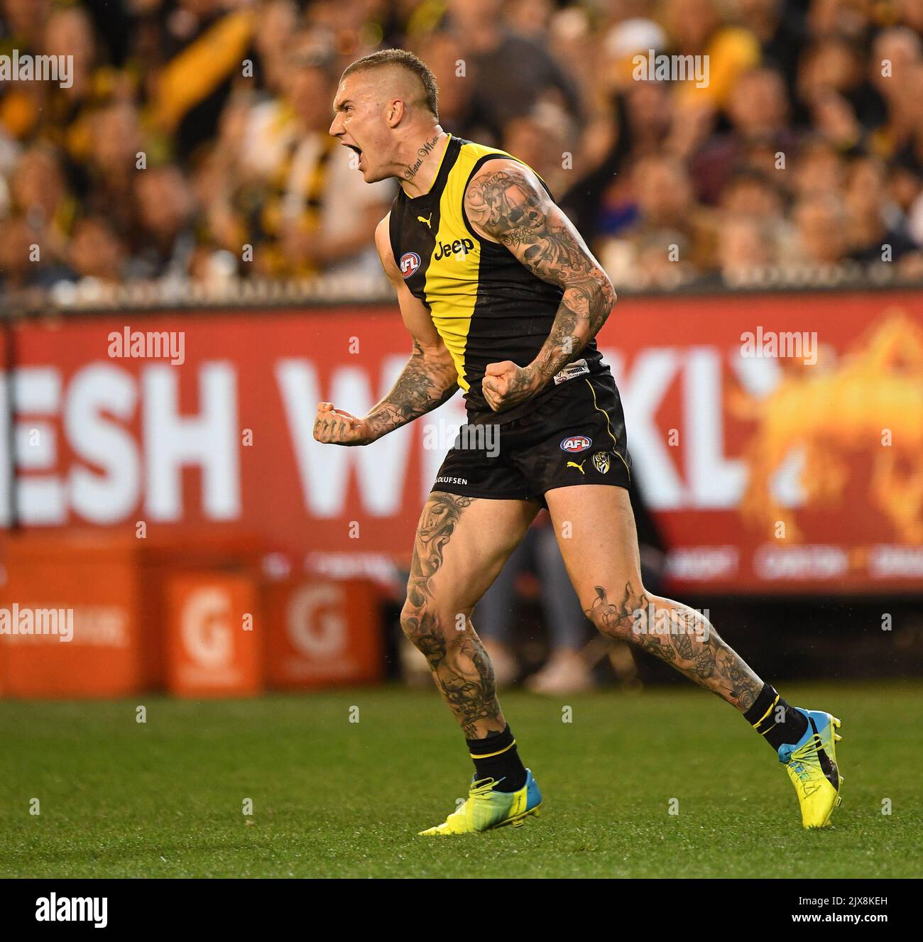Dustin Martin of the Tigers reacts after kicking a goal during the ...