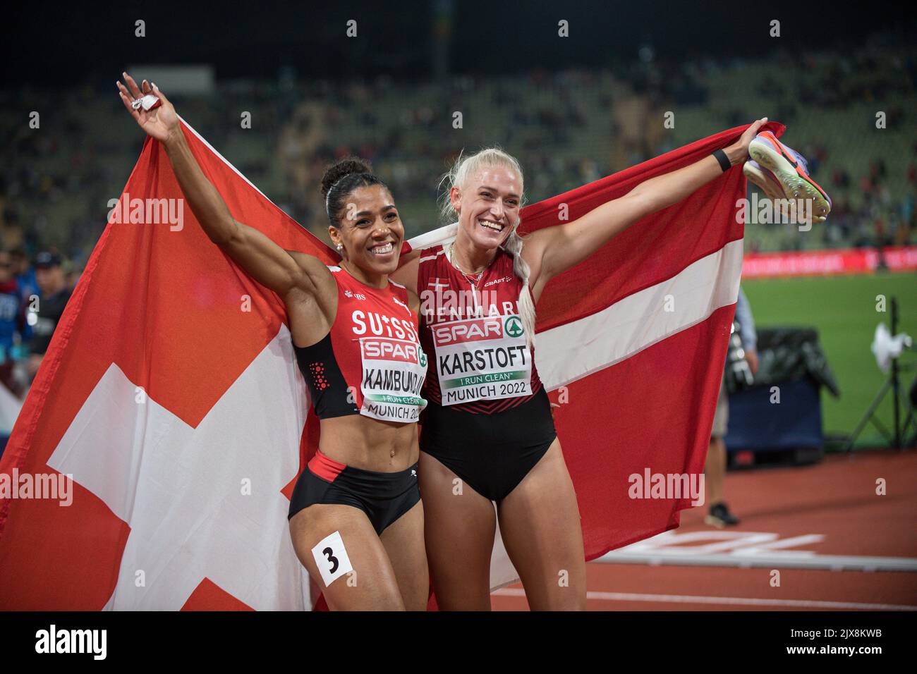 Mujinga Kambundji ,Ida Karstoft with her country's flag at the European ...