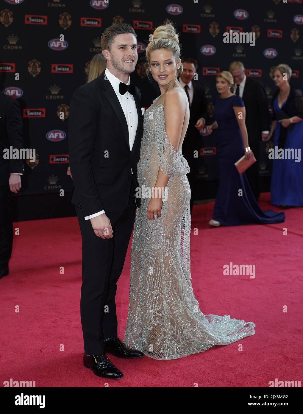 Carlton captain Marc Murphy and his wife Jesse pose for photos on ...