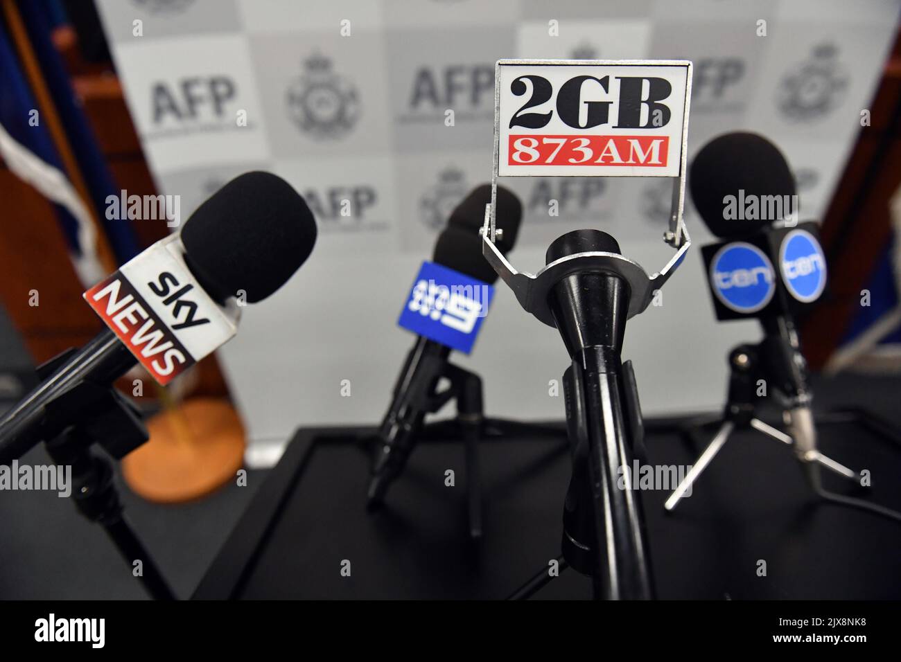 Media microphones are seen at a press conference in Sydney, Thursday ...