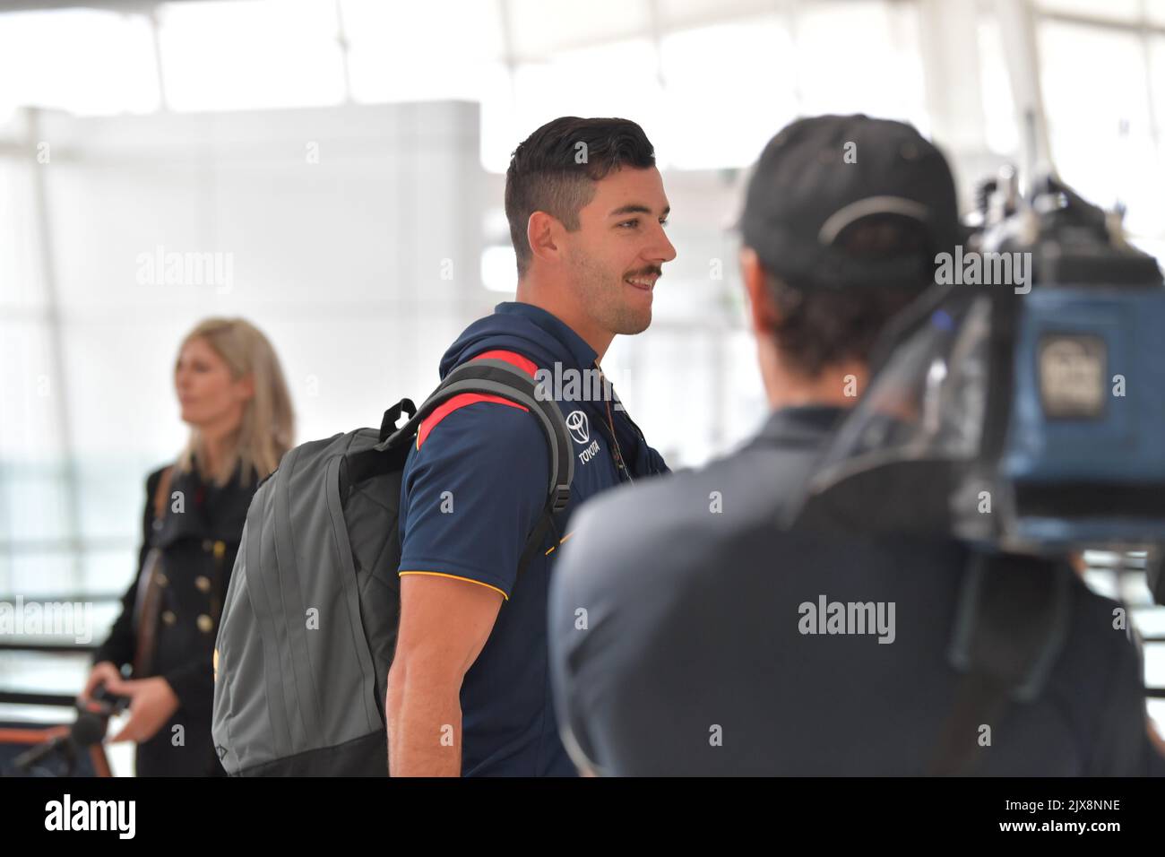 Tex Walker of the Adelaide Crows is seen at the Adelaide Airport after ...