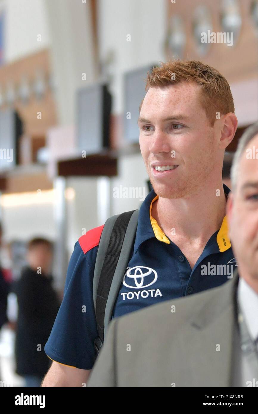 Tom Lynch of the Adelaide Crows is seen at the Adelaide Airport after ...