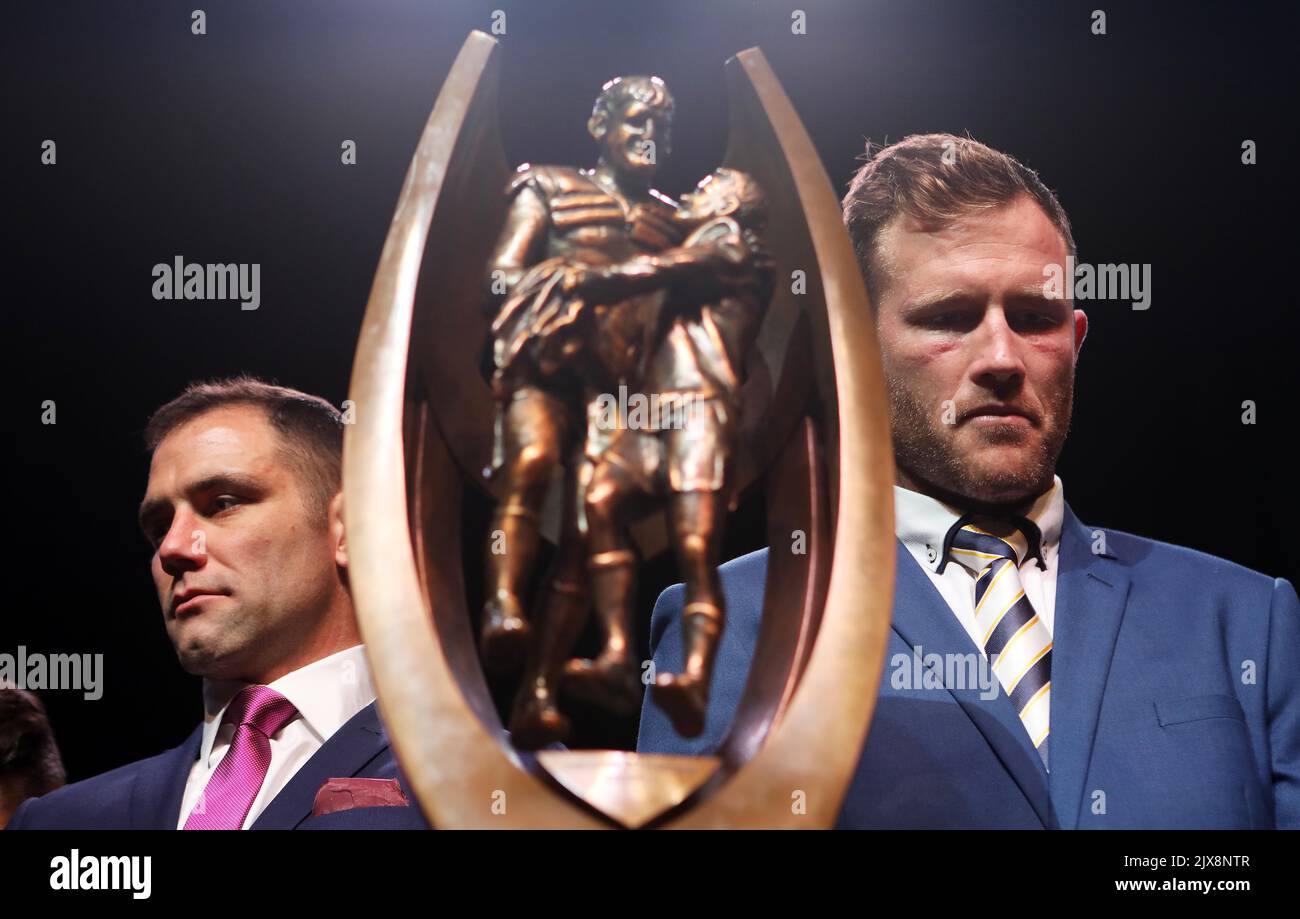 Storm captain Cameron Smith and Cowboys captain Gavin Cooper are seen ...