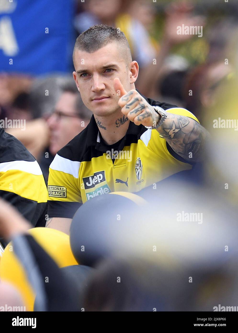 Dustin Martin of the Richmond Tigers raises his thumb during the AFL ...