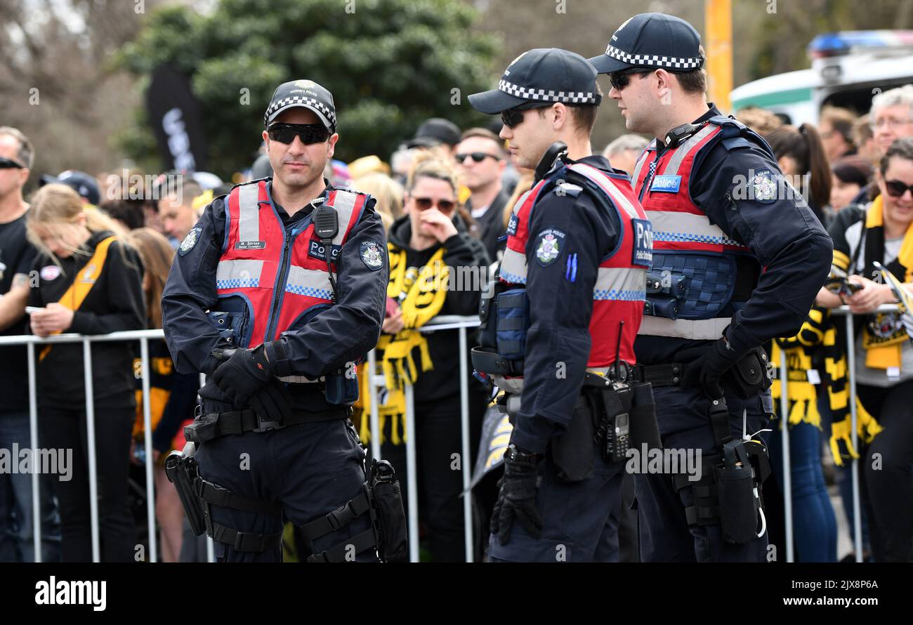 Police are seen at the AFL Grand Final parade in Melbourne, Friday ...