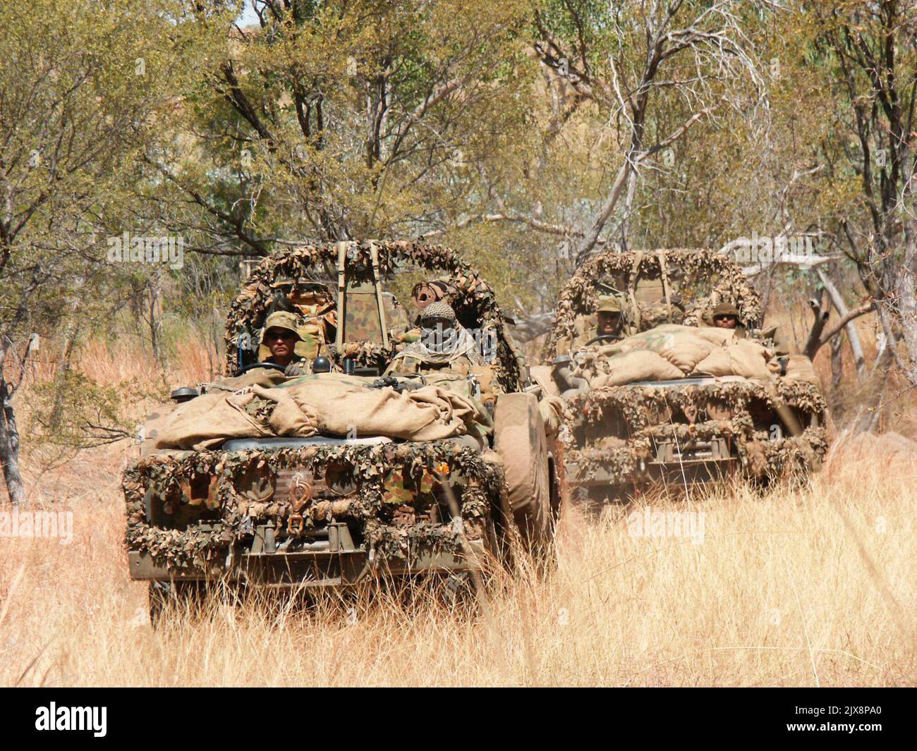A Delta Company Land Rover patrol makes its way overland in the gulf ...