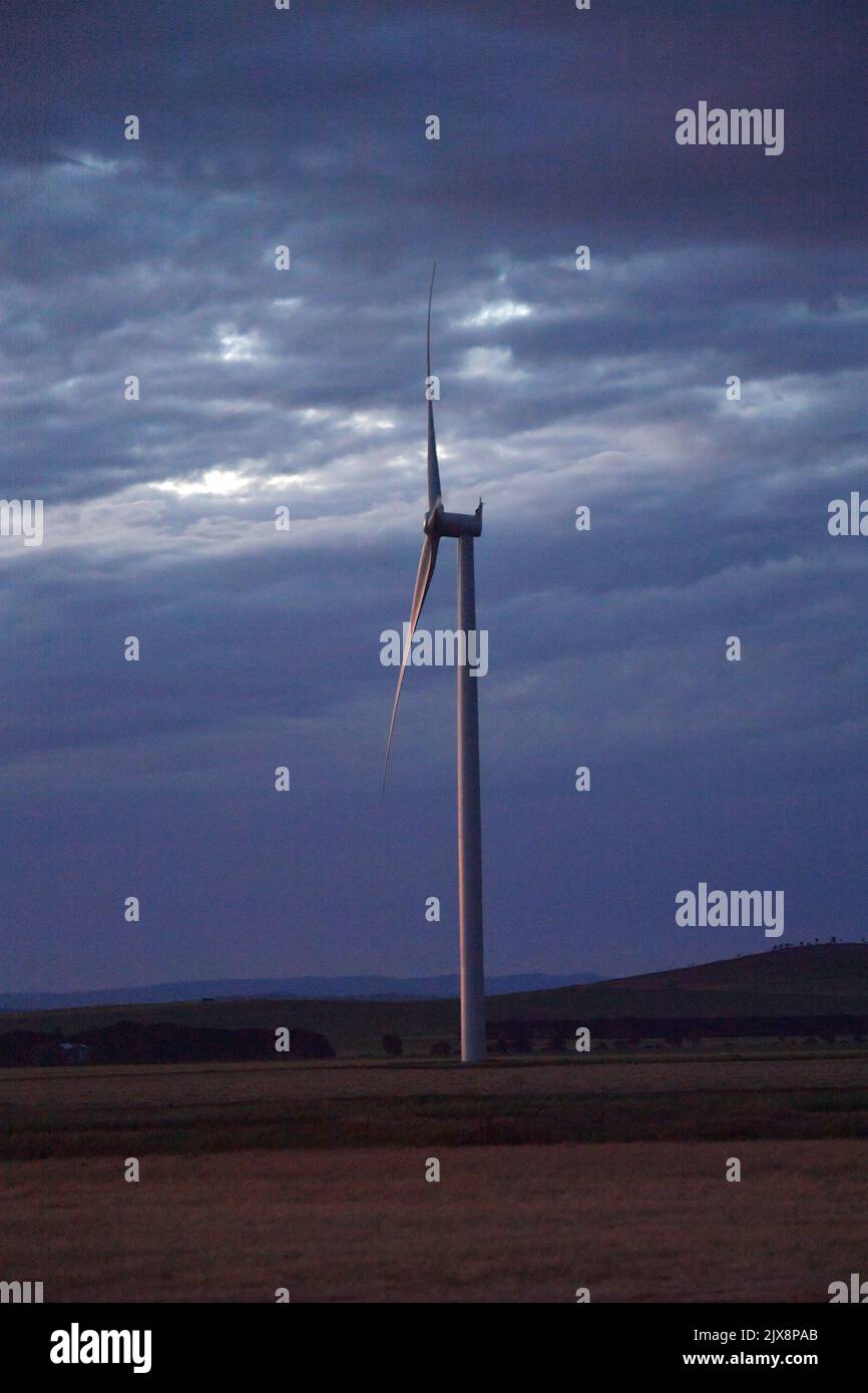 A wind turbine is seen at the TESLA battery plant outside of Jamestown ...
