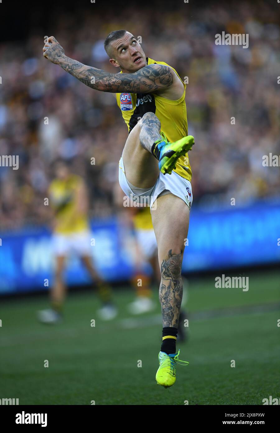 Dustin Martin of the Tigers kicks a goal in the last quarter during the ...