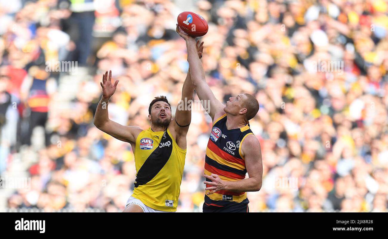 Toby Nankervis of the Tigers (second from left) and Sam Jacobs of the ...