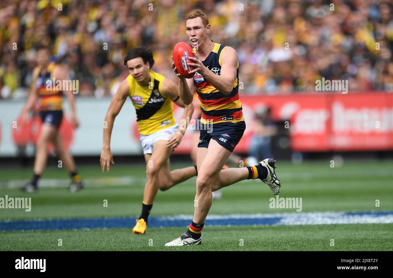 Tom Lynch of the Crows (right) and Daniel Rioli of the Tigers contest ...