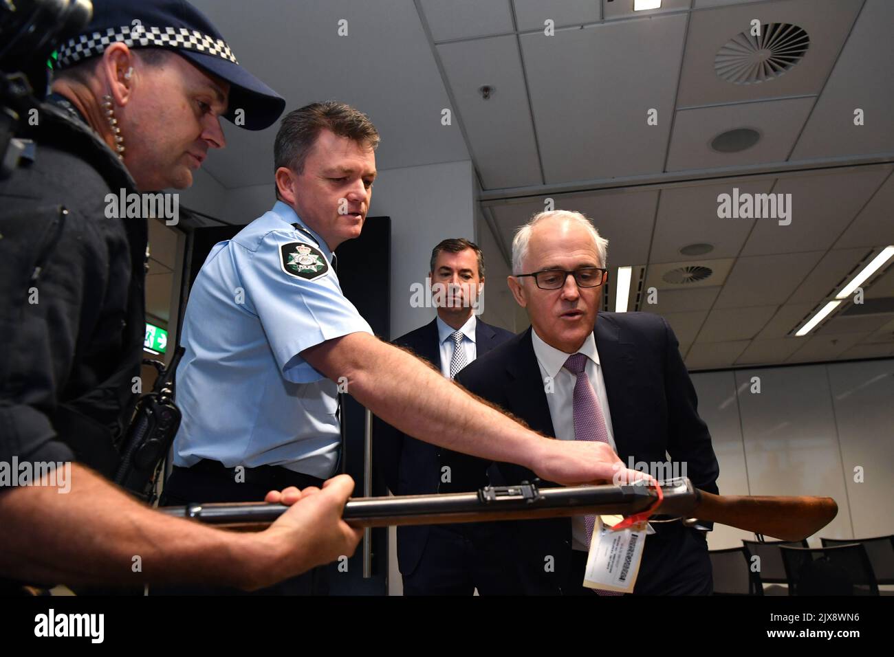Australian Federal Police Commissioner Andrew Colvin (left), Justice ...
