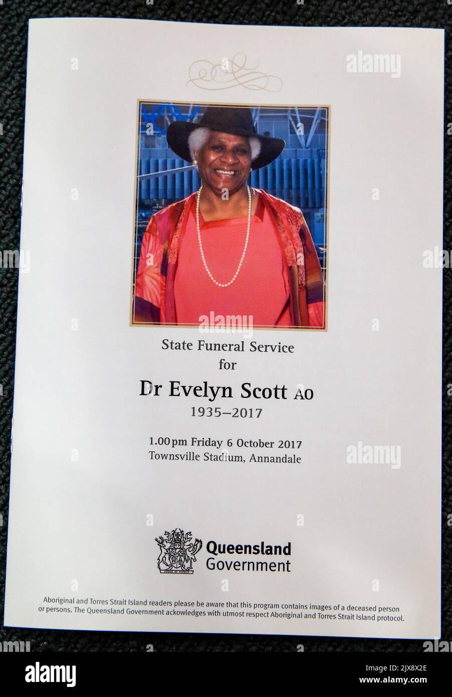 The order of service seen at the state funeral of Dr Evelyn Scott at Townsville Stadium ...