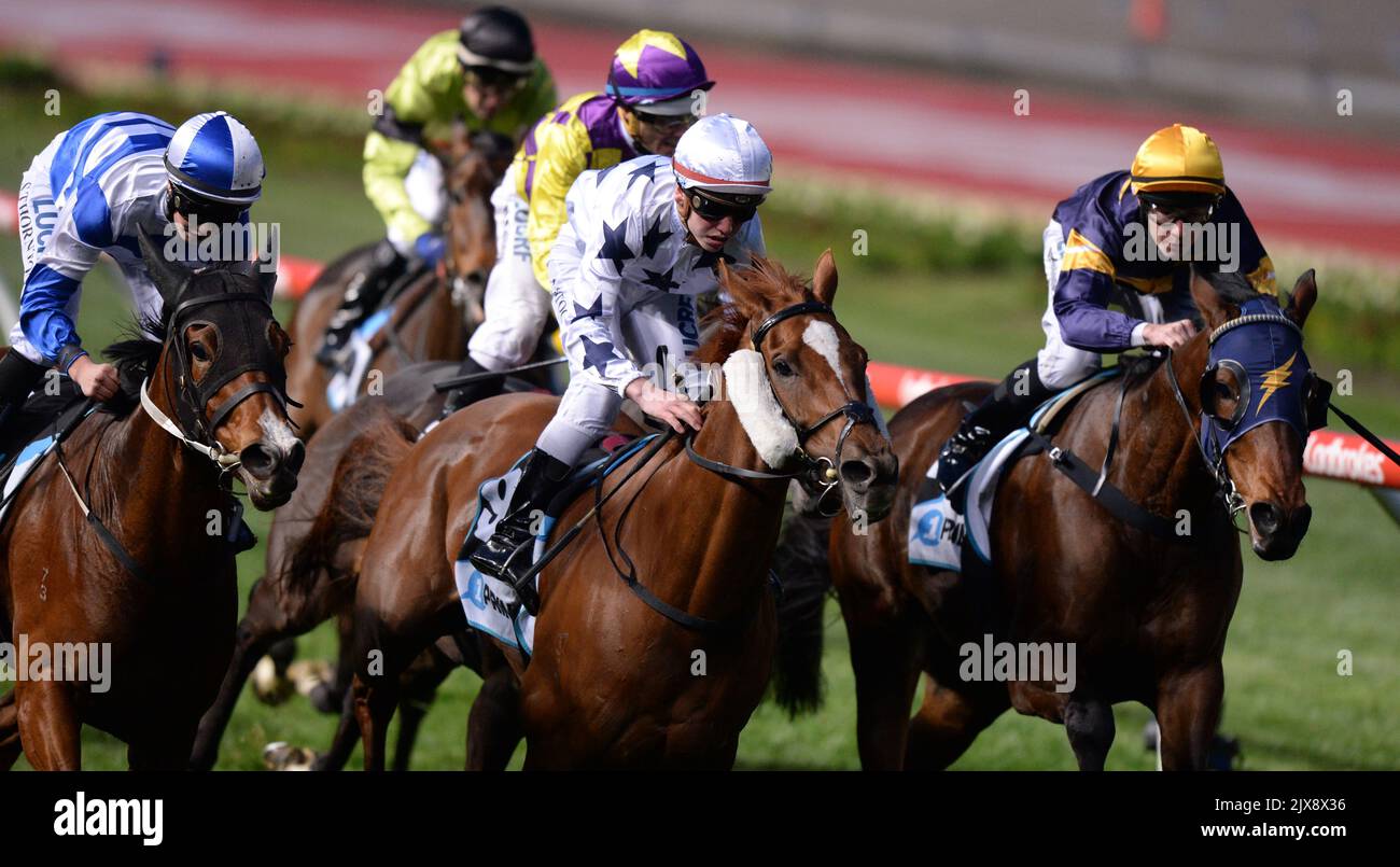 Jockey Brandon Stockdale on Rock Away (centre) on his way to winning ...
