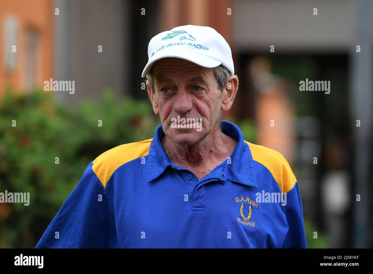 Deploy trainer Gerald Ryan arrives to speak to media following ...