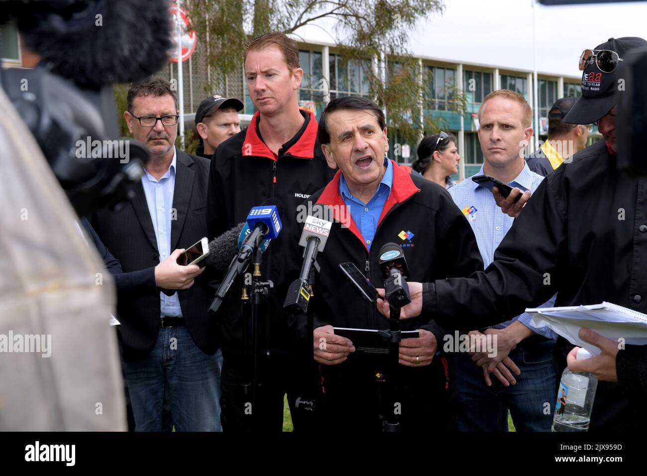 AMWU State Secretary John Camillo speaks to the media outside the ...