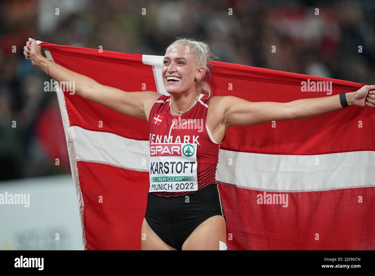 Ida Karstoft with her country's flag at the European Athletics Championships in Munich 2022 ...