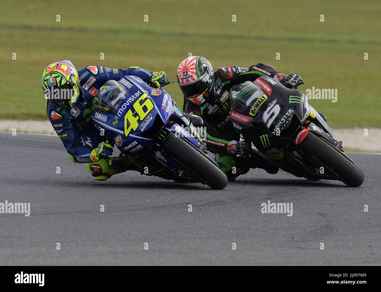 Valentino Rossi of Italy for Movistar Yamaha MotoGP (left) and Johann ...