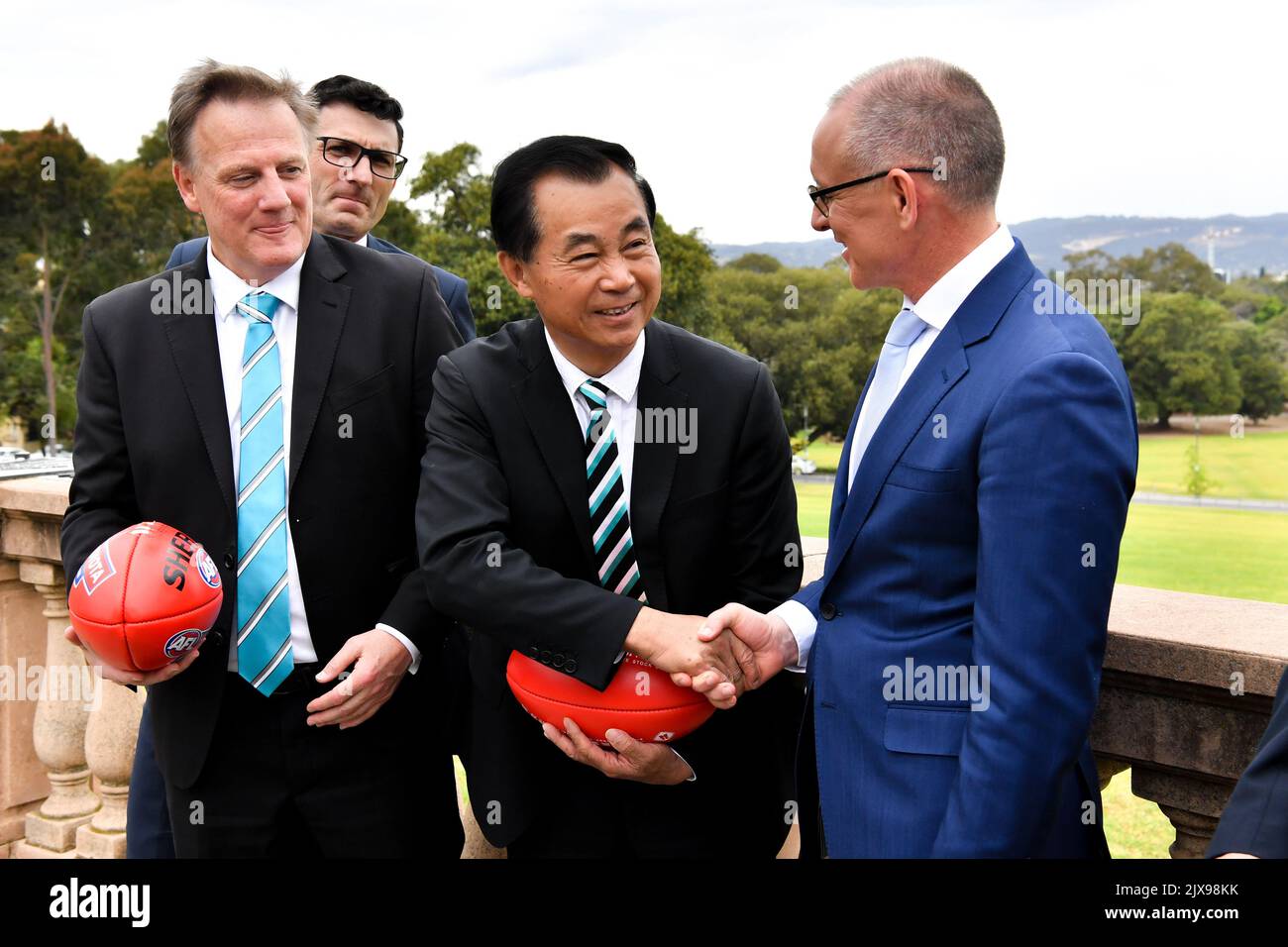Keith Thomas, Guojie Gui and South Australian Premier Jay Weatherill ...